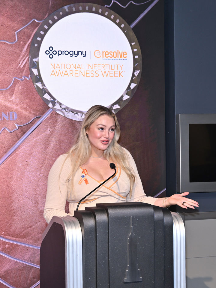 Iskra Lawrence Lights ESB Orange for National Infertility Awareness ...