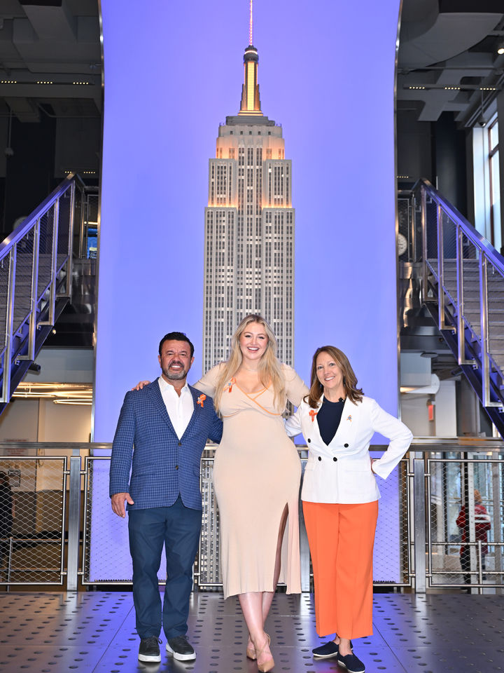 Iskra Lawrence Lights ESB Orange for National Infertility Awareness ...